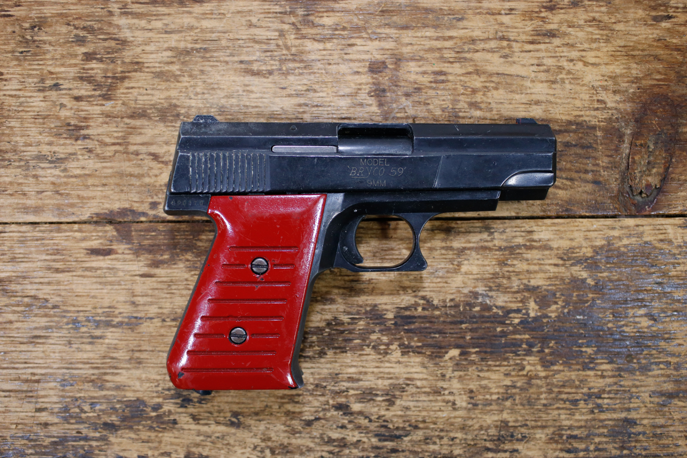 Bryco 59 9mm Police Trade-In Pistol with Red Grips (Magazine Not ...