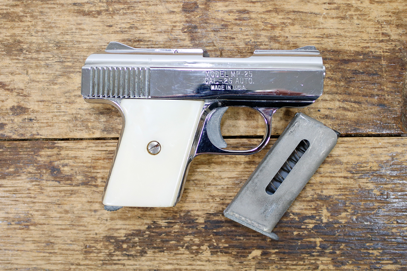 Raven Arms MP-25 25 Auto Police Trade-In Pistol with White Grips ...