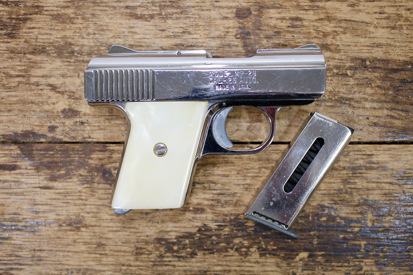 Raven Arms MP-25 25 Auto Police Trade-In Pistol with White Grips ...