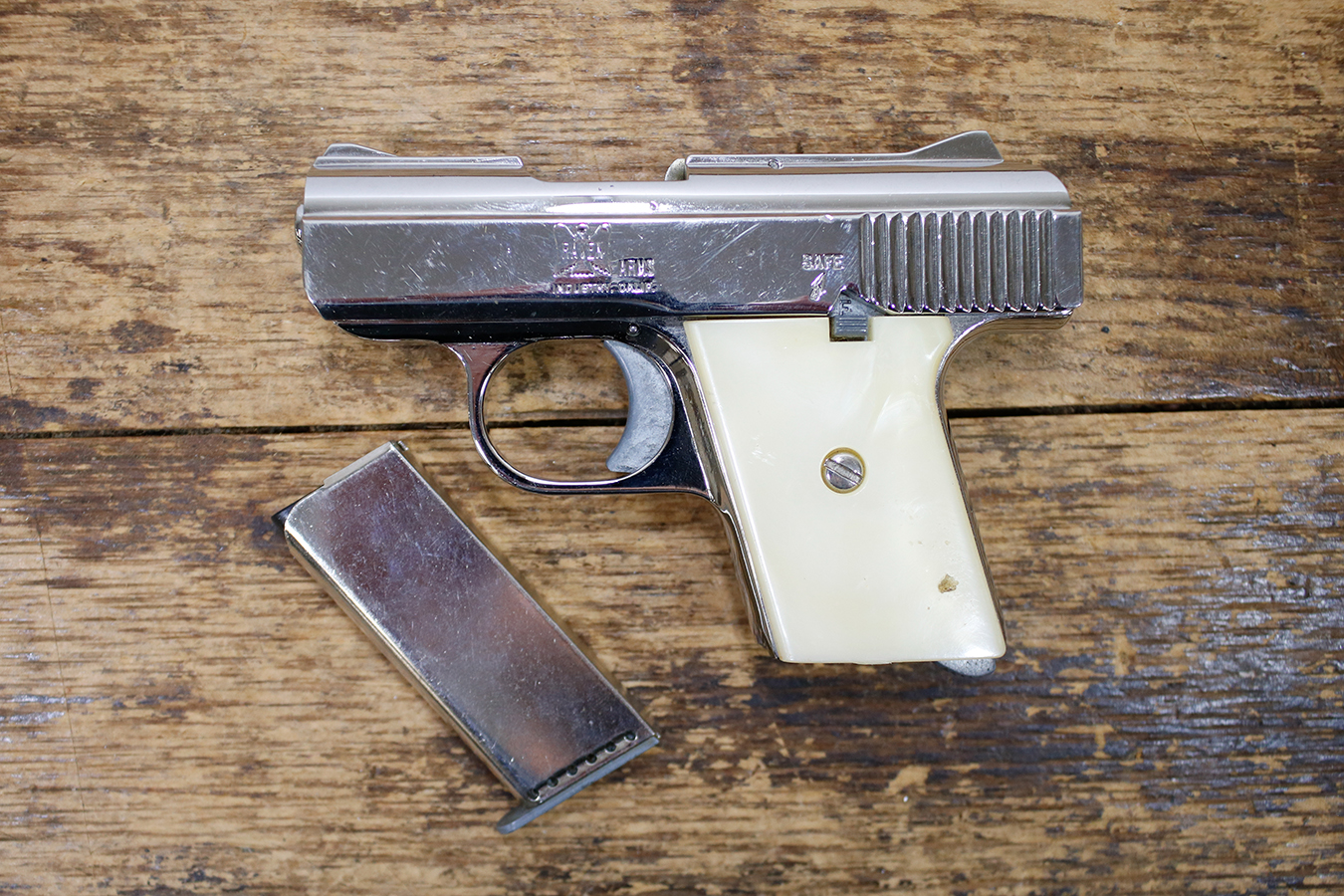 Raven Arms MP-25 25 Auto Police Trade-In Pistol with White Grips ...