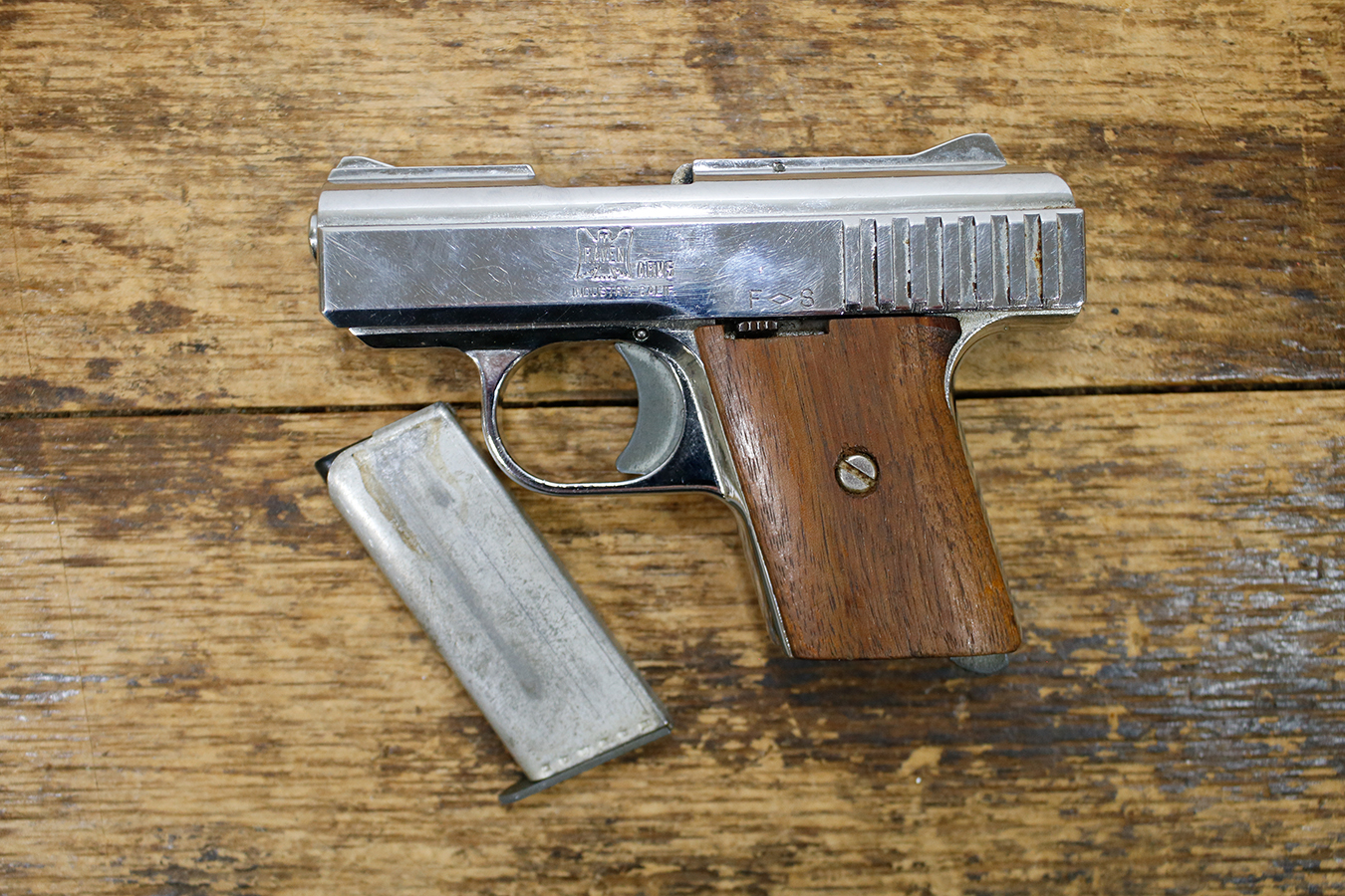 Raven Arms P-25 25 Auto Police Trade-In Pistol Wood Grips | Sportsman's ...